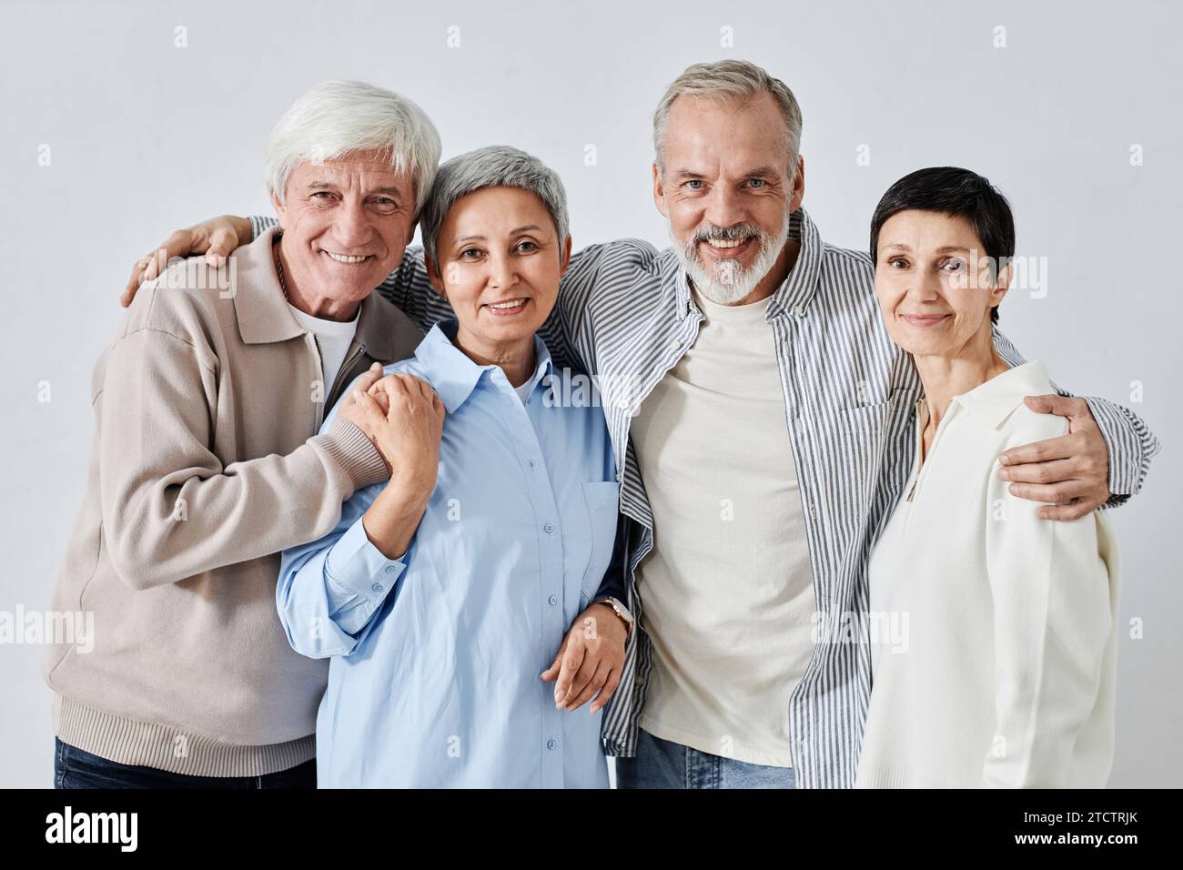 Group elderly multi ethnic friends hi-res stock photography and images ...