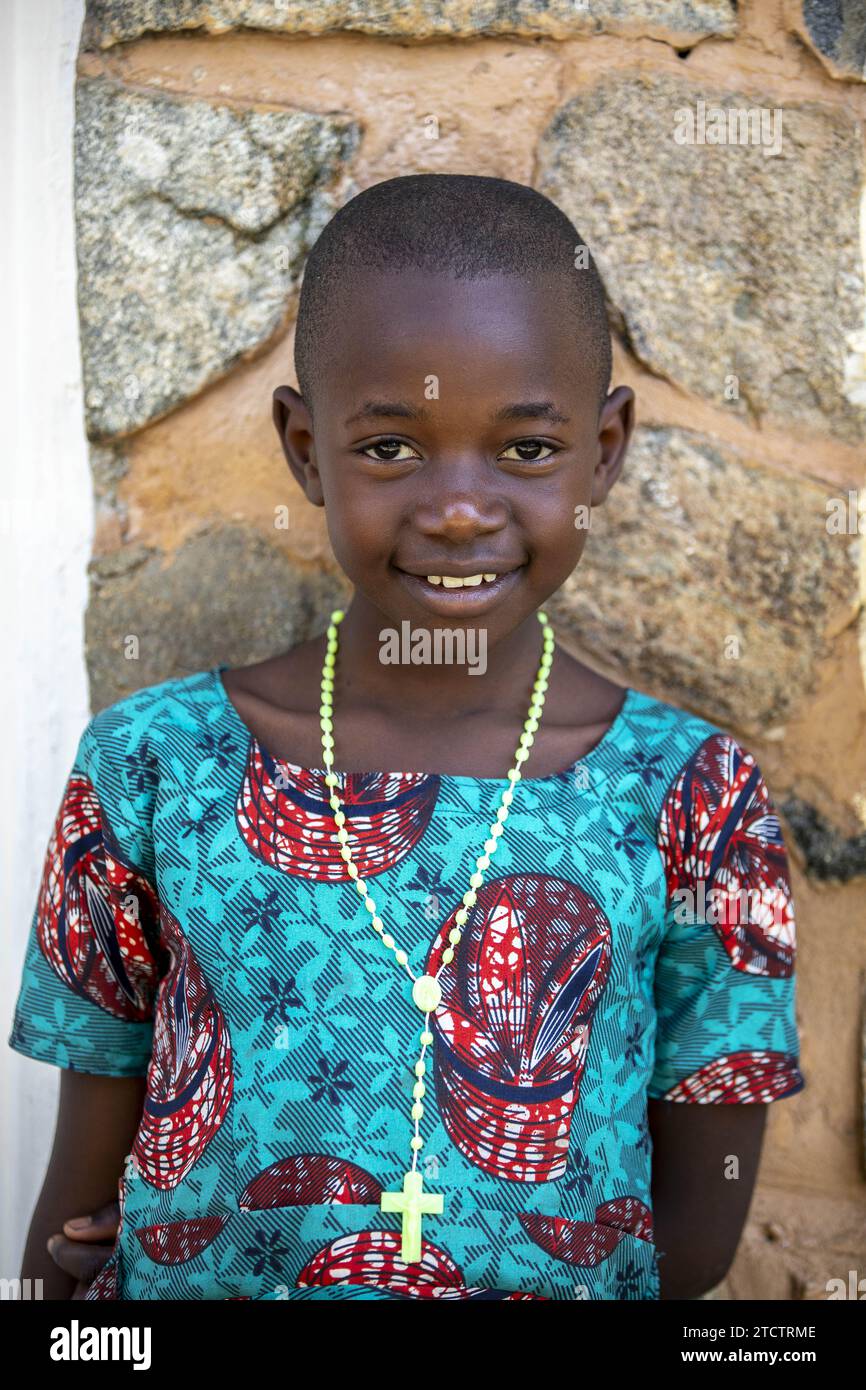 Parishioner outside Saint Peter’s catholic church, Karongi, Rwanda ...
