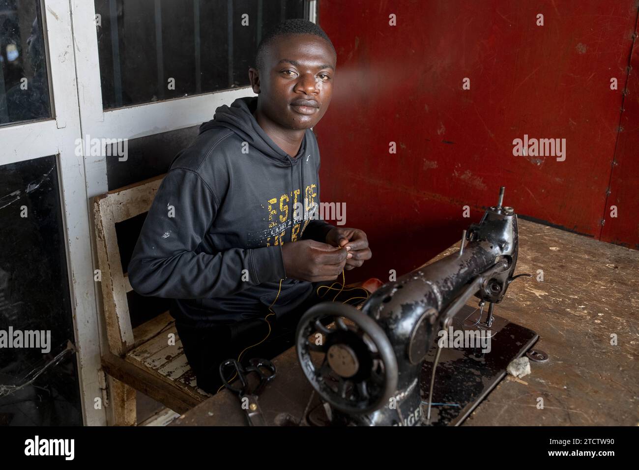 Taylor at Huye market, southern province, Rwanda Stock Photo - Alamy