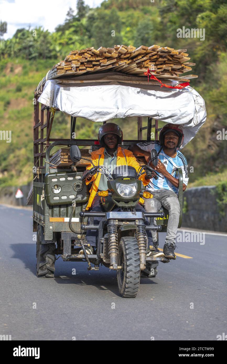 3-wheeler vehicle on a road in western Rwanda Stock Photo - Alamy