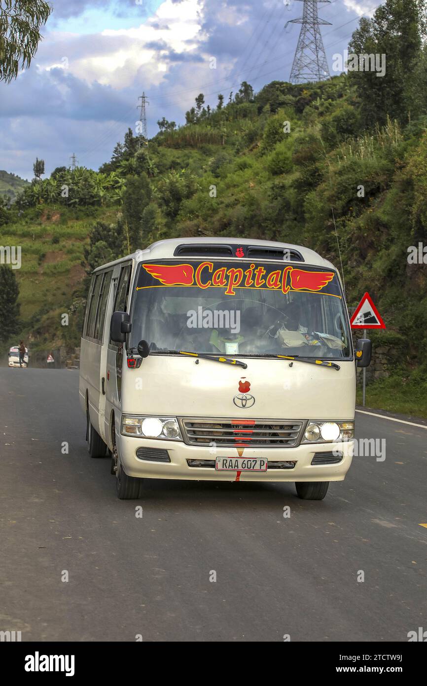Bus on an uphill road in western Rwanda Stock Photo - Alamy