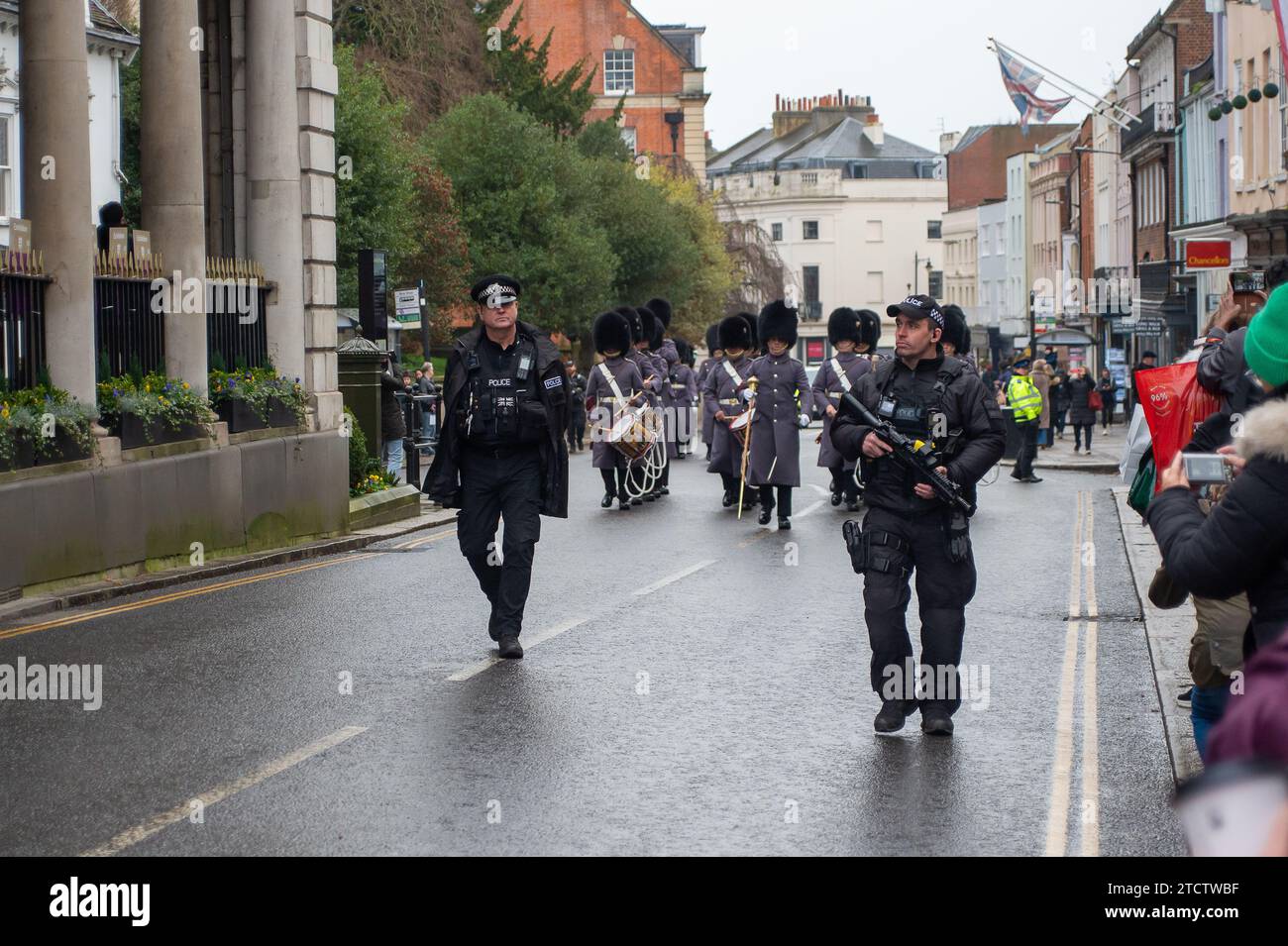Windsor, Berkshire, UK. 14th December, 2023. Armed Police lead the ...