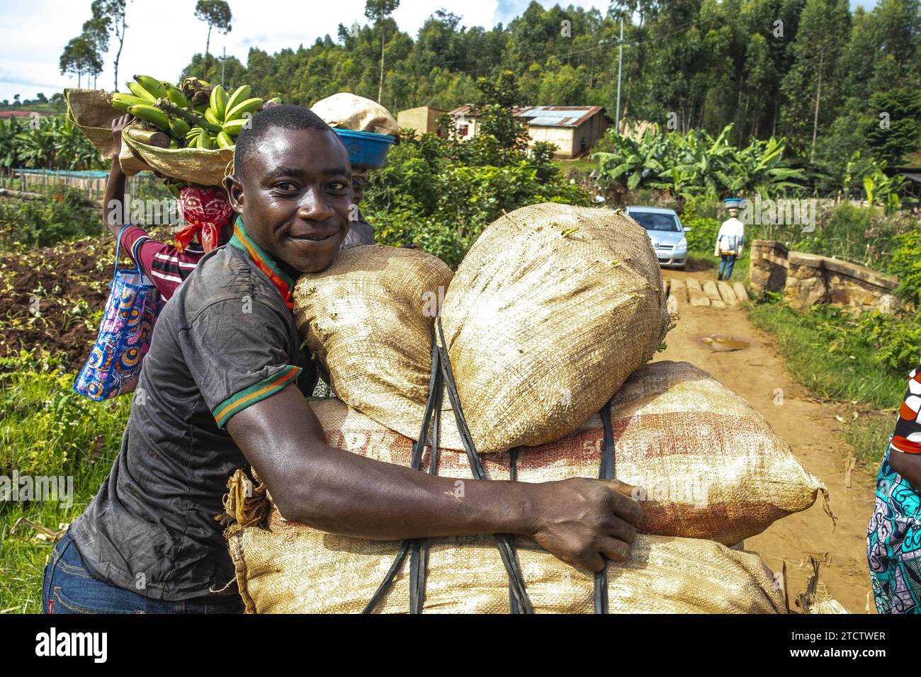 Villagers going to market to sell goods, Southern province, Rwanda ...