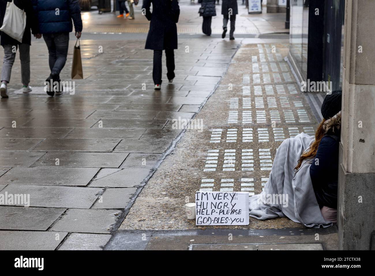 Homeless person on Oxford street, London, U.K Stock Photo - Alamy