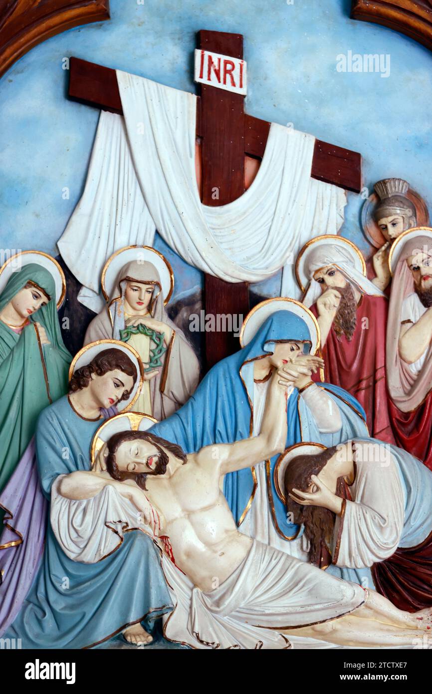 Huyen Si Church. Way of the cross. Station 13. Jesus is taken down from ...