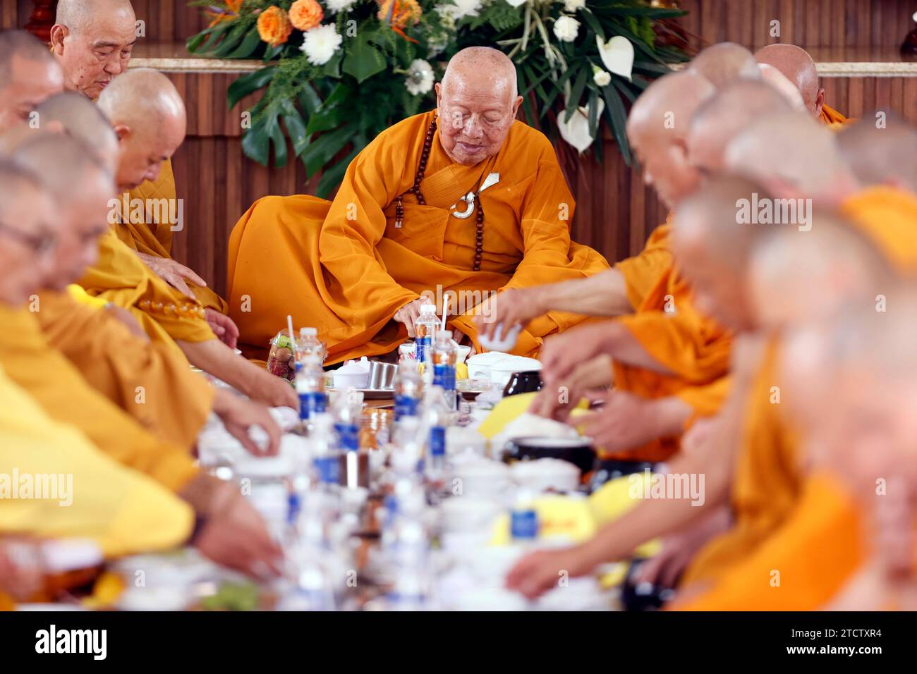 Phuoc Hue buddhist pagoda. Monks at buddhist ceremony in the main hall ...