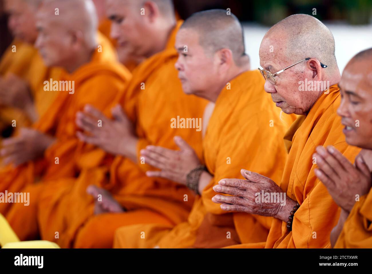 Phuoc Hue buddhist pagoda. Monks at buddhist ceremony praying in the ...