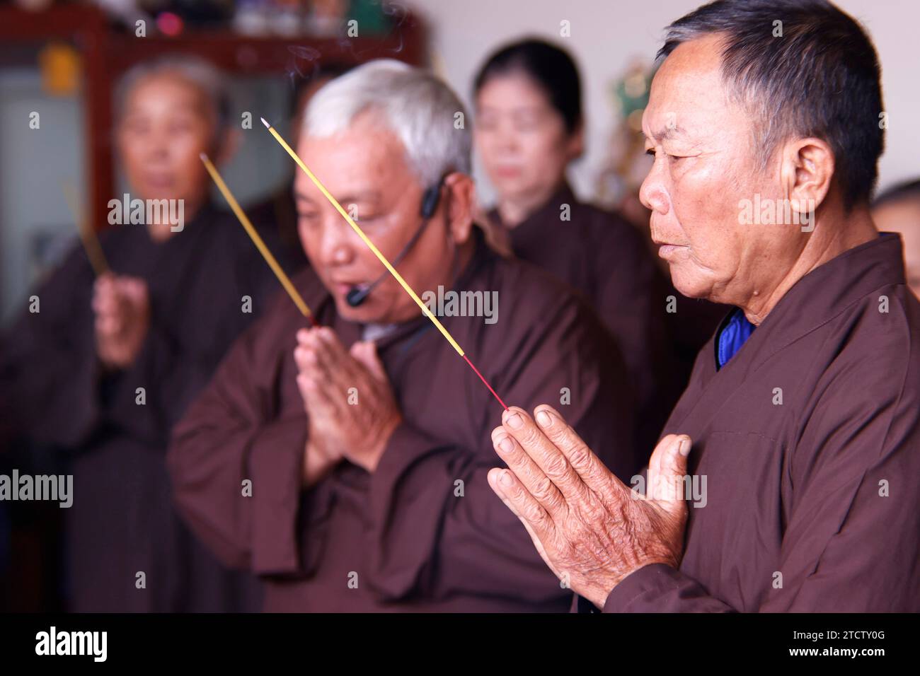Funeral ceremony in a Buddhist family. Prayers for the deceased. Tan ...