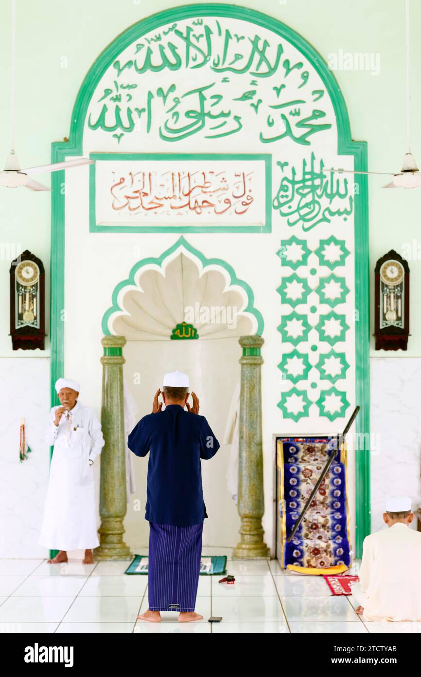 Jamiul Azhar mosque. The friday prayer (salat). The Muezzin calling to ...