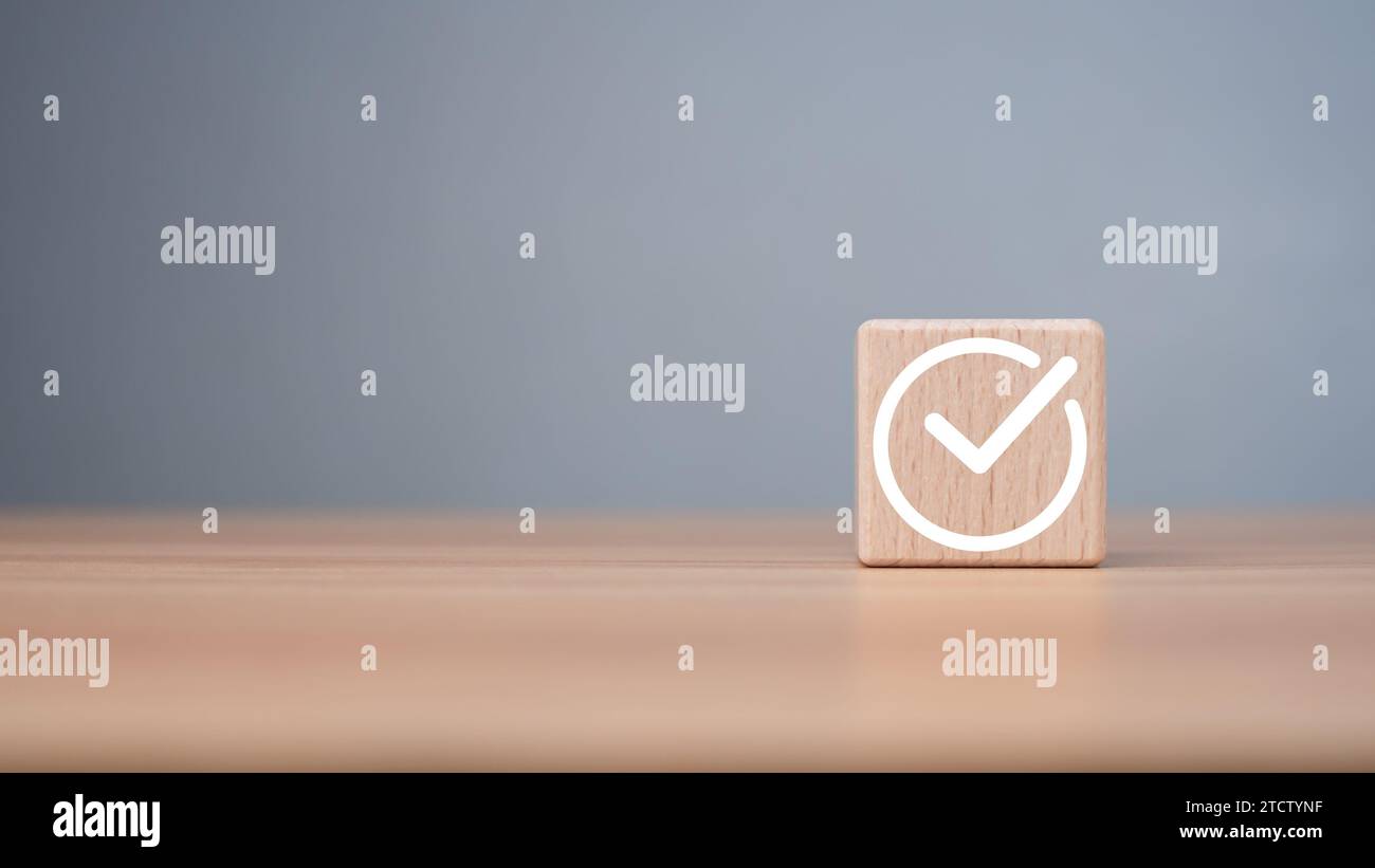 Checklist concept, Check mark on wooden blocks wooden background with ...