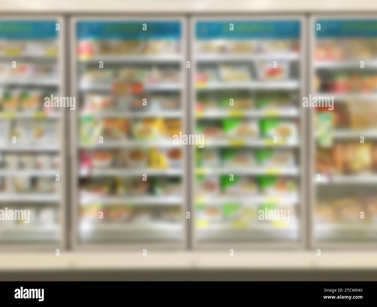 Commercial refrigerators in a large supermarket blurred background ...