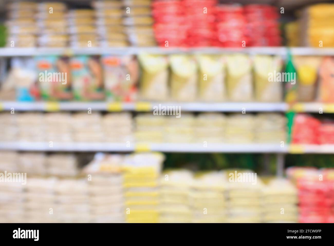 supermarket with rice shelves blur background Stock Photo - Alamy