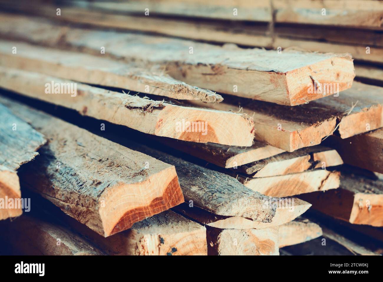 Large stack of wood planks, teak wood Stock Photo - Alamy