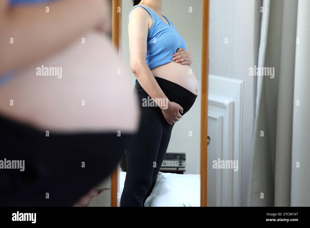 Pregnant belly in a mirror hi-res stock photography and images - Alamy