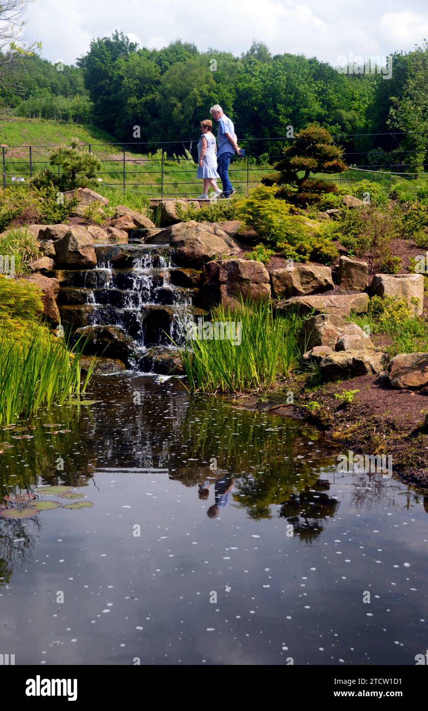 Couple People/Holidaymakers Walking on a Path by the Chinese Streamside ...