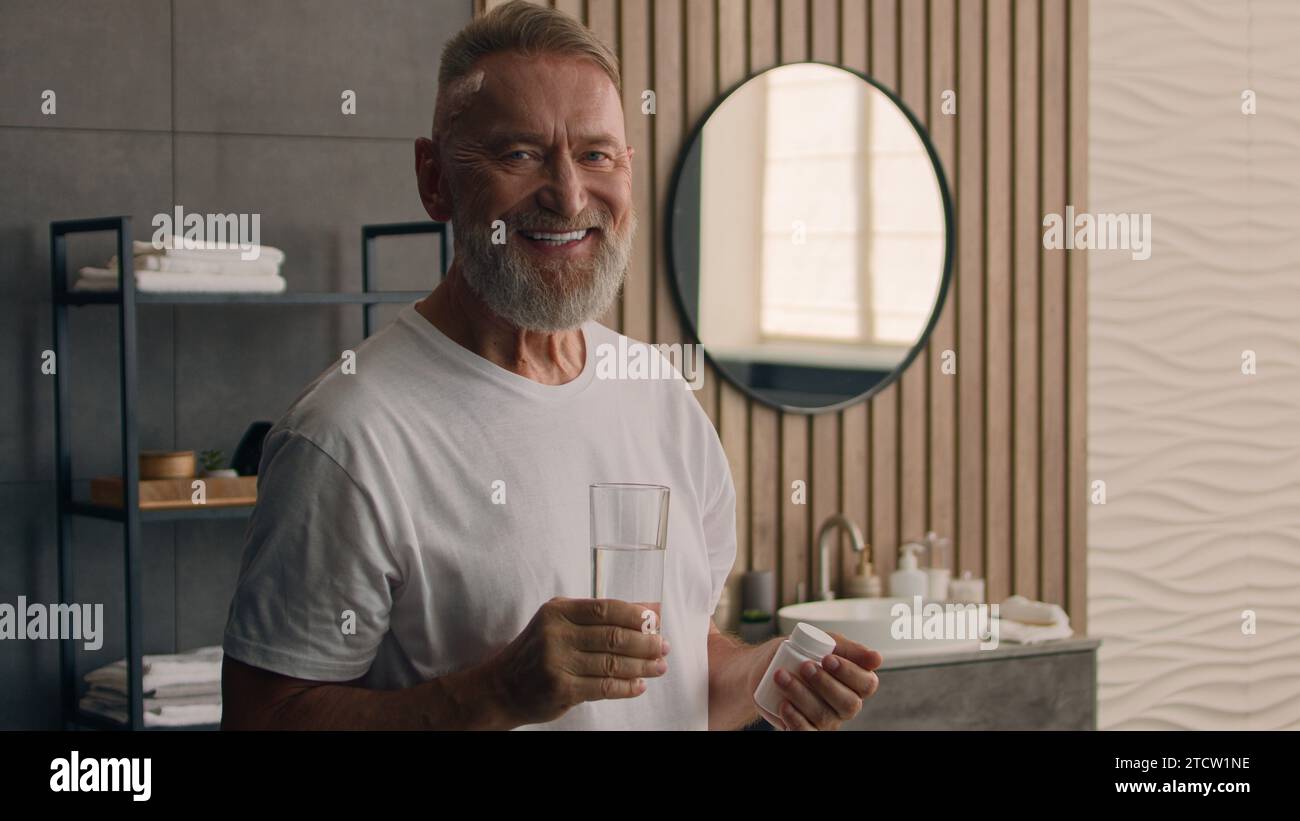 Old man drinking water care home hi-res stock photography and images ...