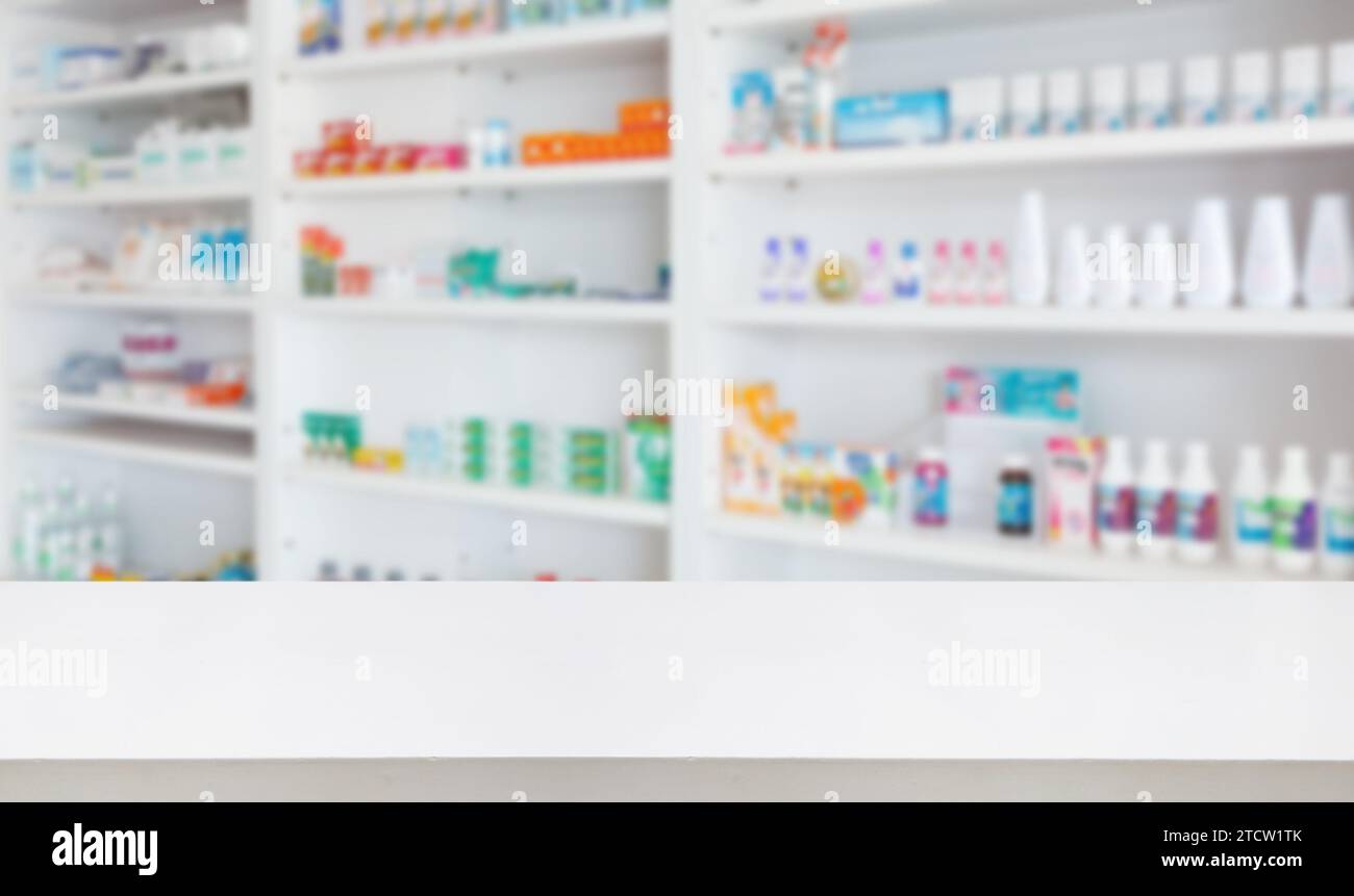 Pharmacy drugstore counter table with blur abstract backbround with ...