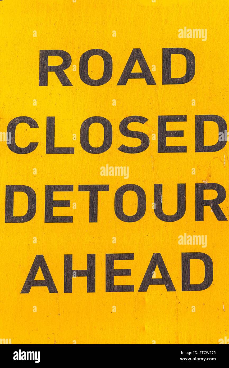 Road construction warning sign words Road Closed Detour Ahead. Close-Up ...
