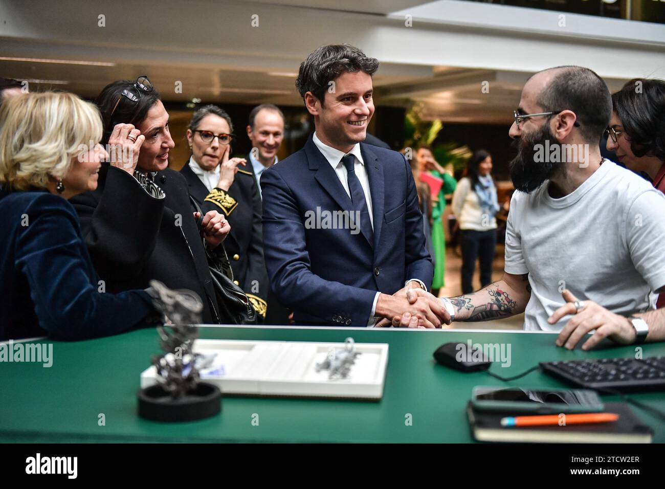 French Education and Youth Minister Gabriel Attal (C) visits workshops ...