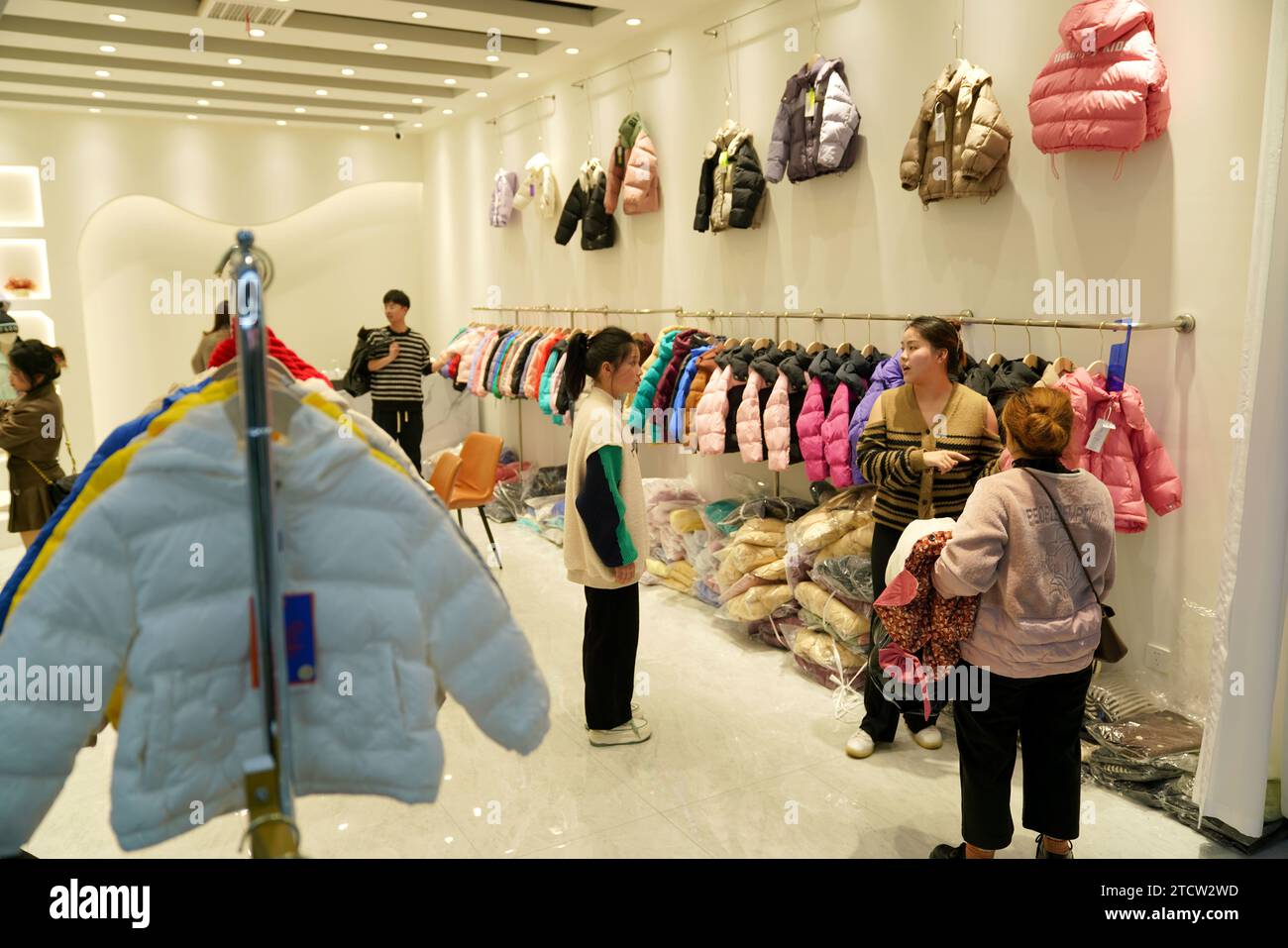 Pinghu, China's Zhejiang Province. 14th Dec, 2023. Customers select ...