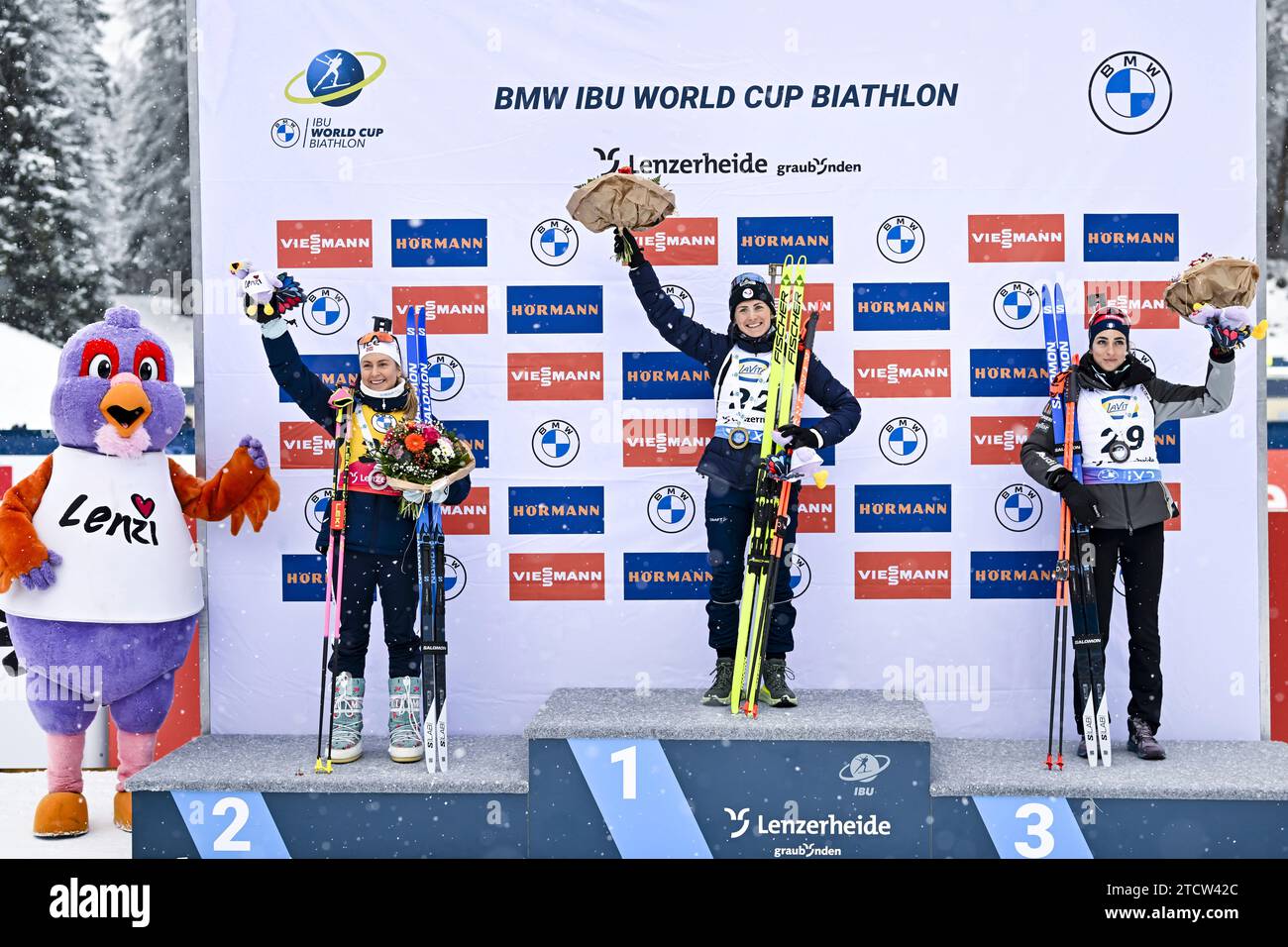 France's Justine Braisaz-Bouchet, center, winner of a women's 7.5 km ...