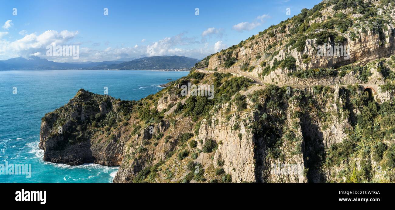 A landscape view of the Costa di Maratea with a narrow and winding ...