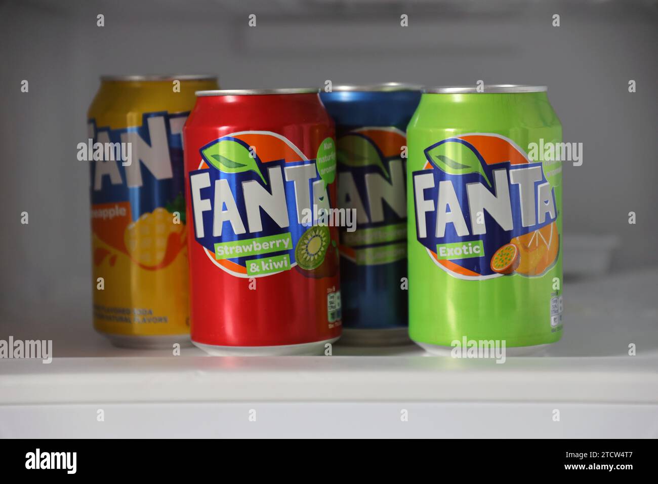 KYIV, UKRAINE - 4 MAY, 2023: Fanta soft drink brand tin cans with ...