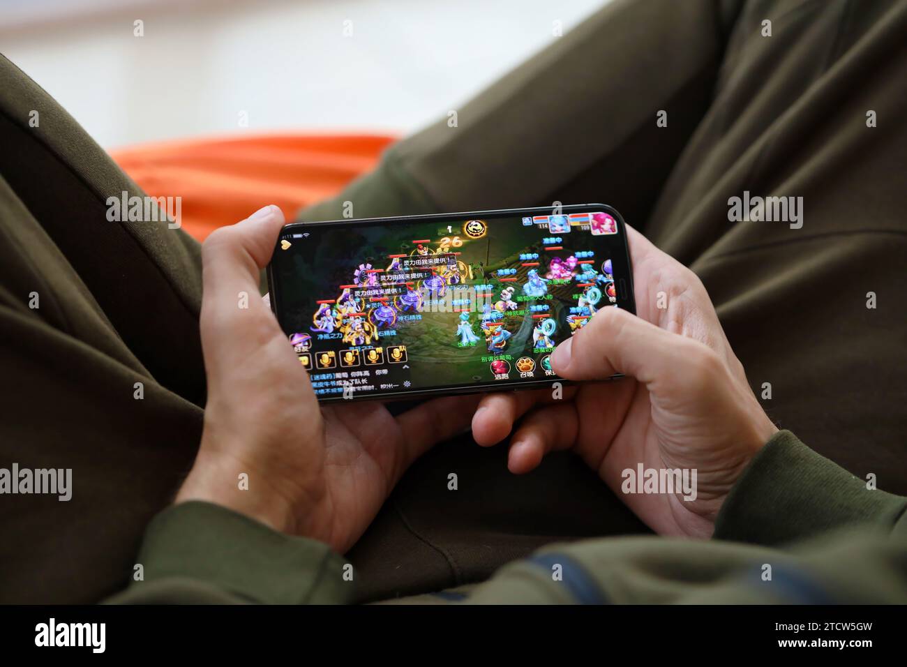 Fantasy Westward Journey mobile iOS game on iPhone 15 smartphone screen ...