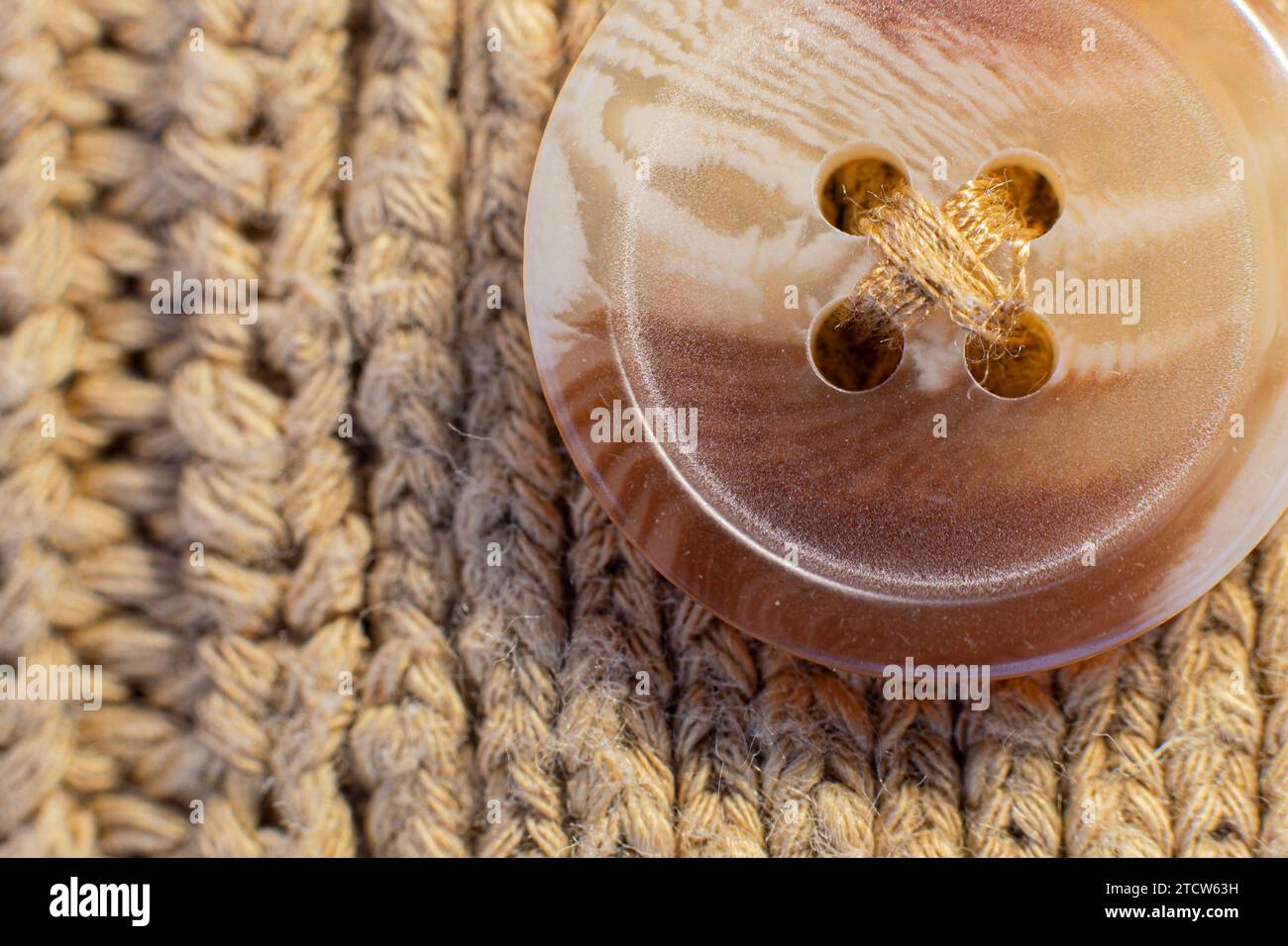 Detail of a clothing button and the texture of the fabric Stock Photo ...