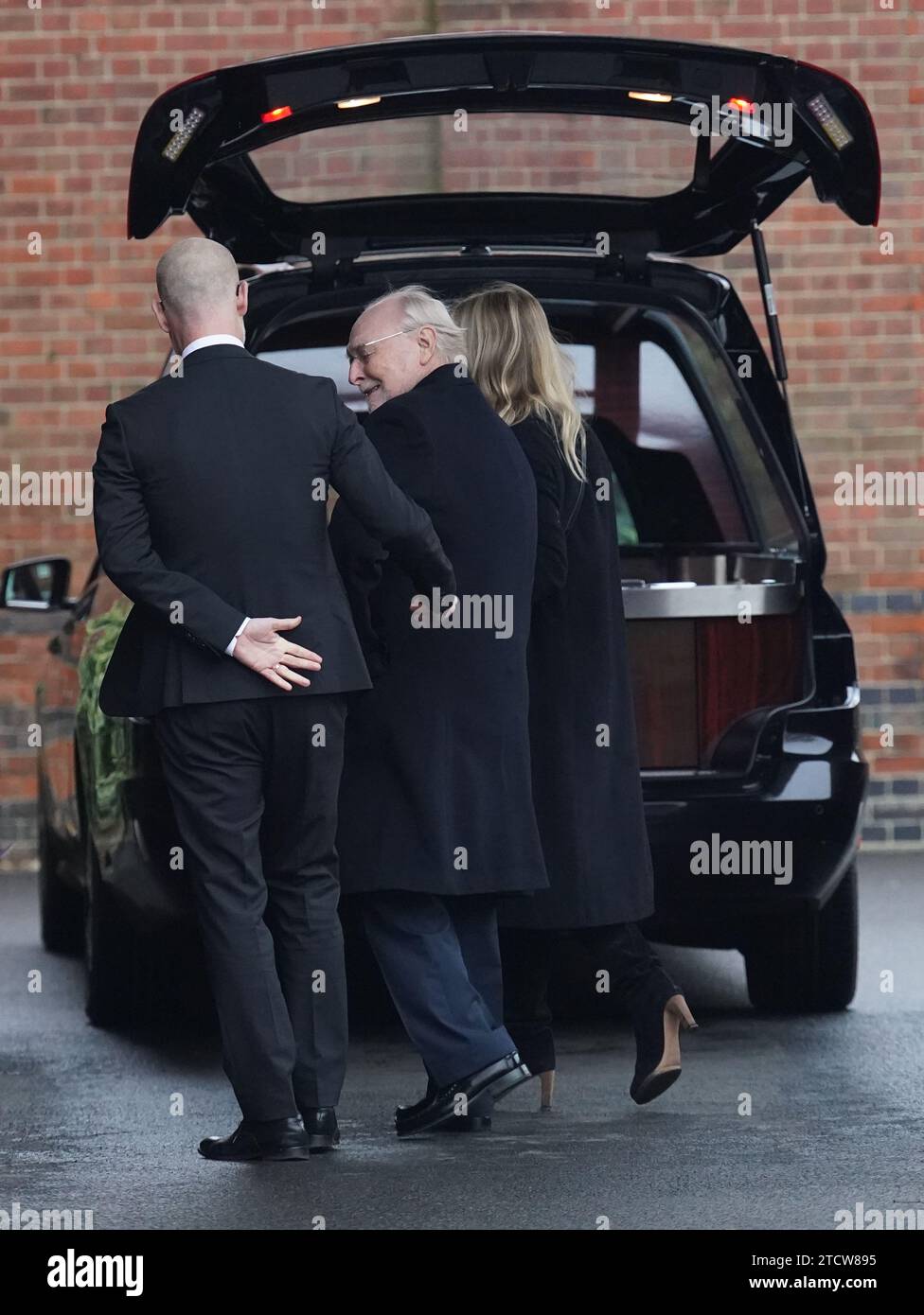 Neil Kinnock arrives with his son Stephen (left) and daughter Rachel ...