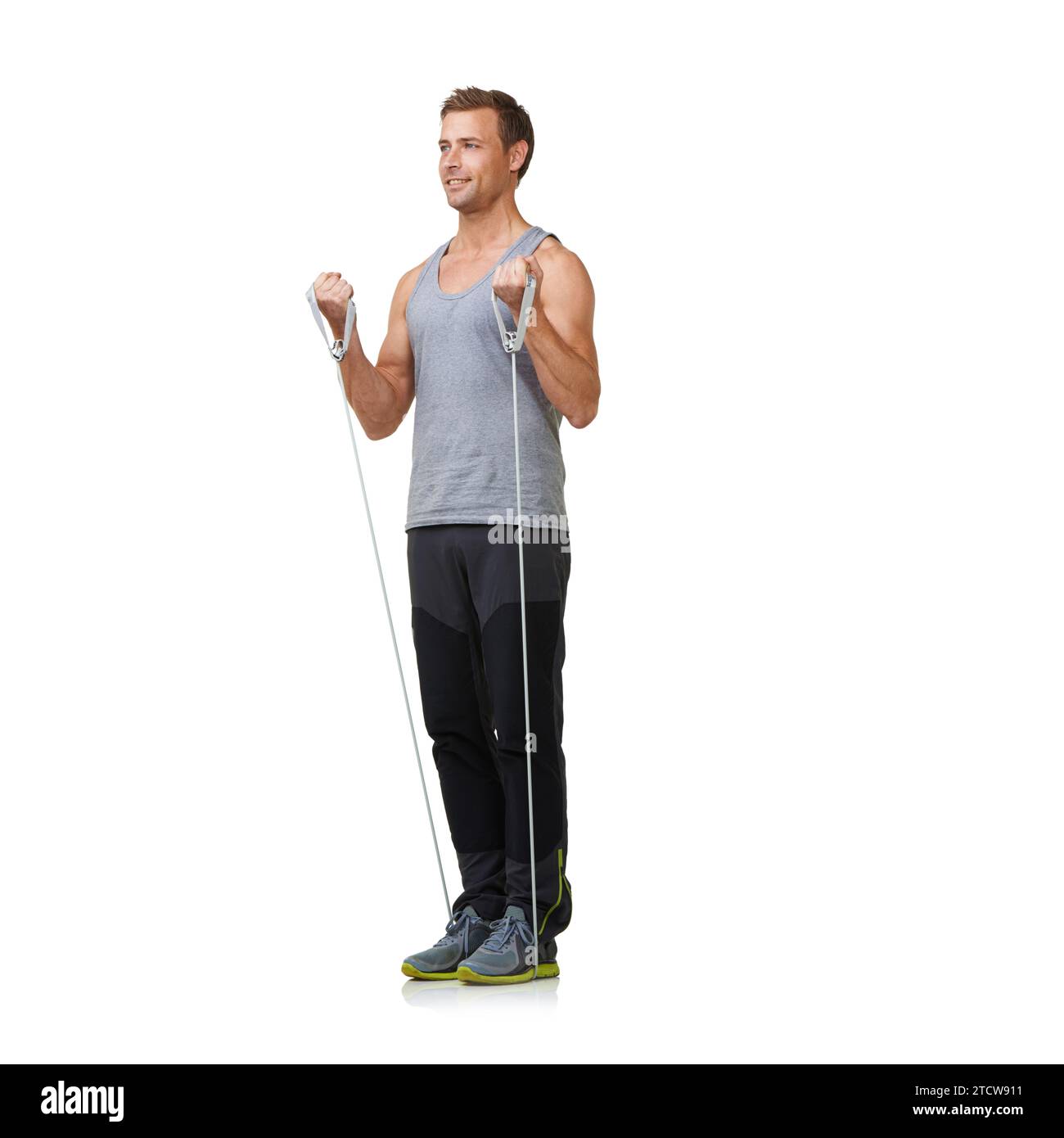 Strong young man stretching muscles Cut Out Stock Images & Pictures - Alamy