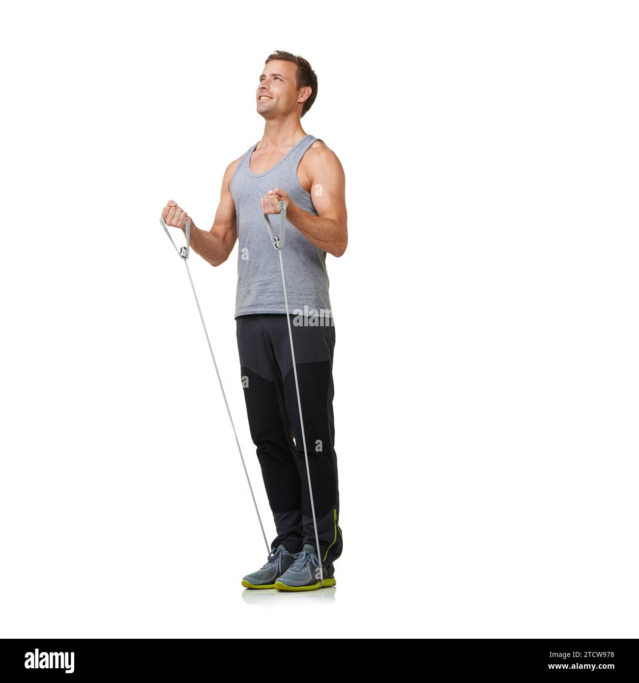 Training, man and resistance band for workout in studio, gym and happy ...