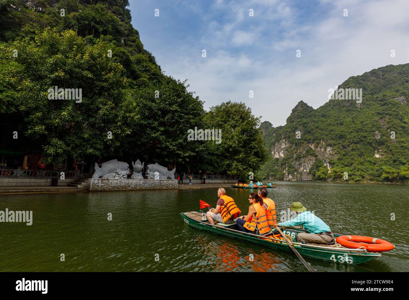 Tourist on a boat tour at Tam Coc in vietnam Stock Photo - Alamy