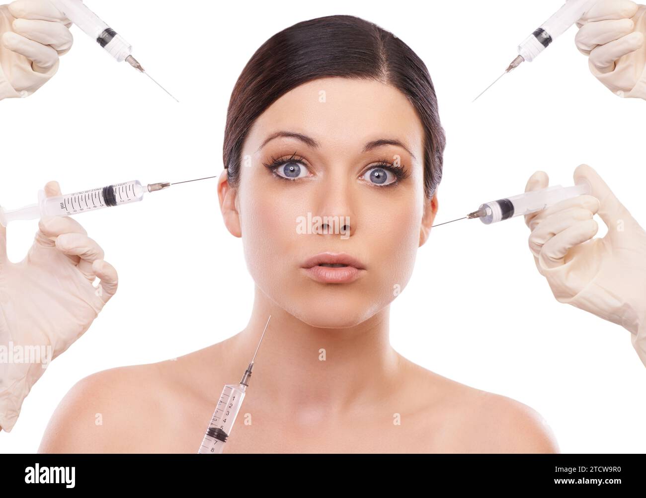 Woman, portrait and syringe for plastic surgery in shock in studio ...