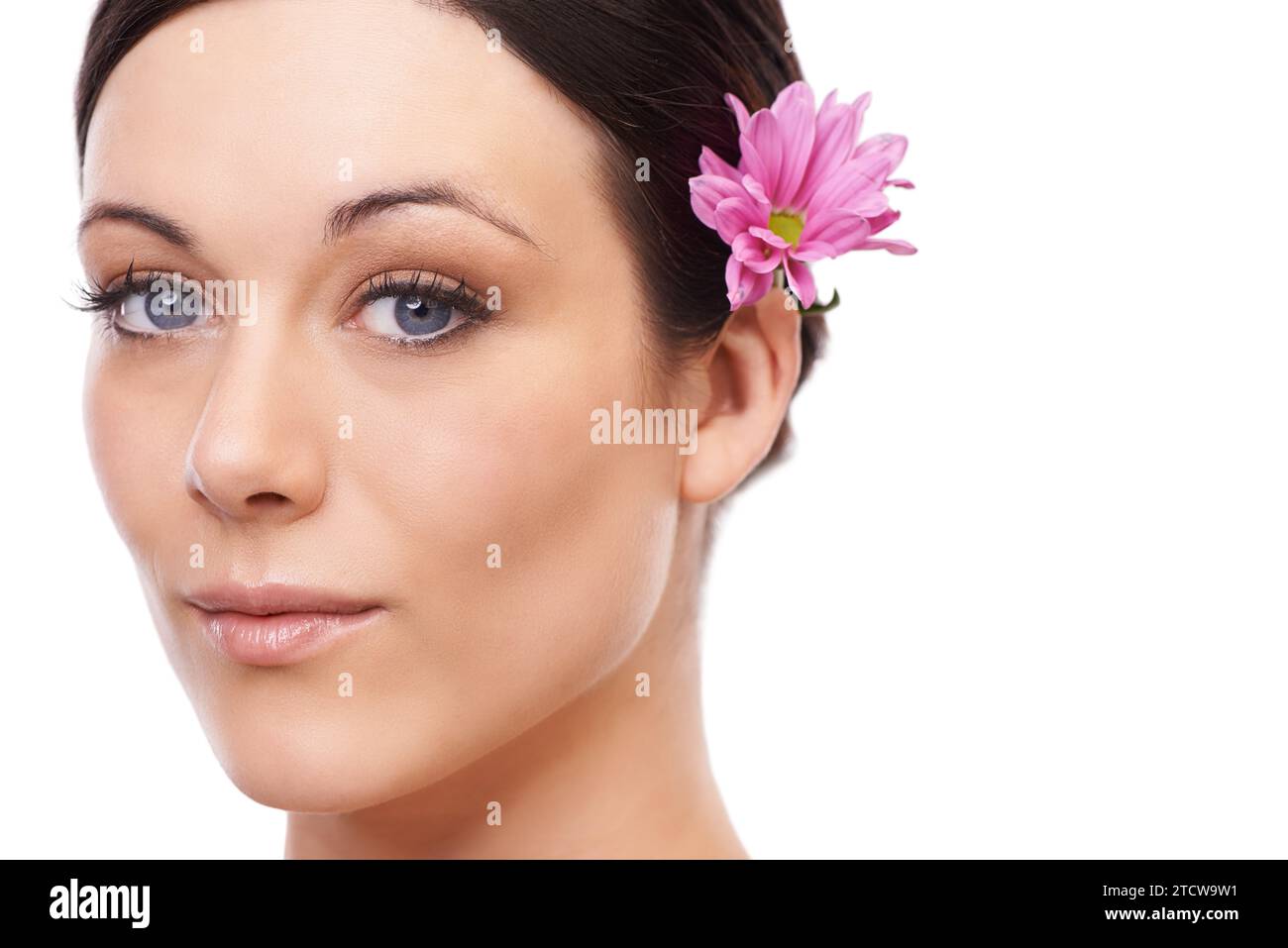 Flower, portrait and woman in studio for makeup, wellness or natural ...