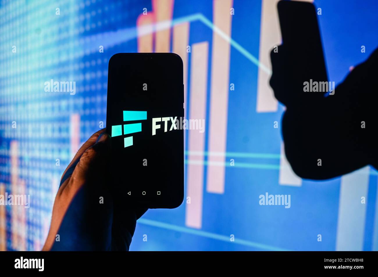 In this photo illustration a FTX logo is displayed on a smartphone with ...