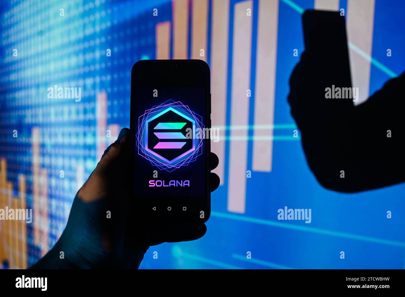 In this photo illustration a Solana logo is displayed on a smartphone ...
