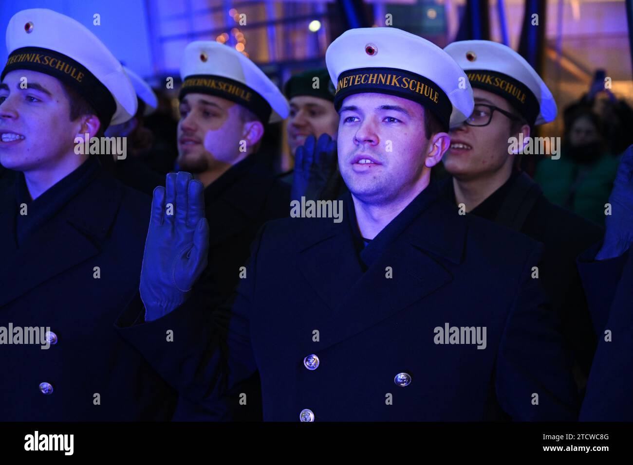 Stralsund, Germany. 14th Dec, 2023. Bundeswehr recruits stand in the ...