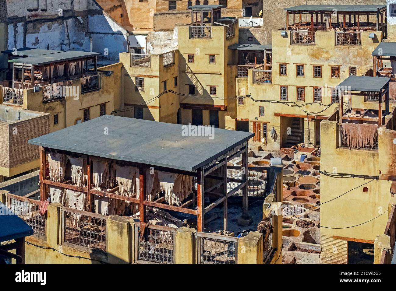 Sidi Moussa Tannery with round stone vessels filled with dye and ...