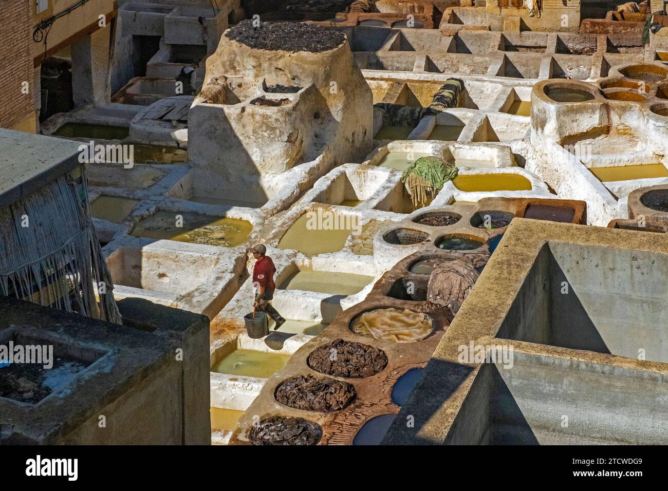 Sidi Moussa Tannery with round stone vessels filled with dye and ...