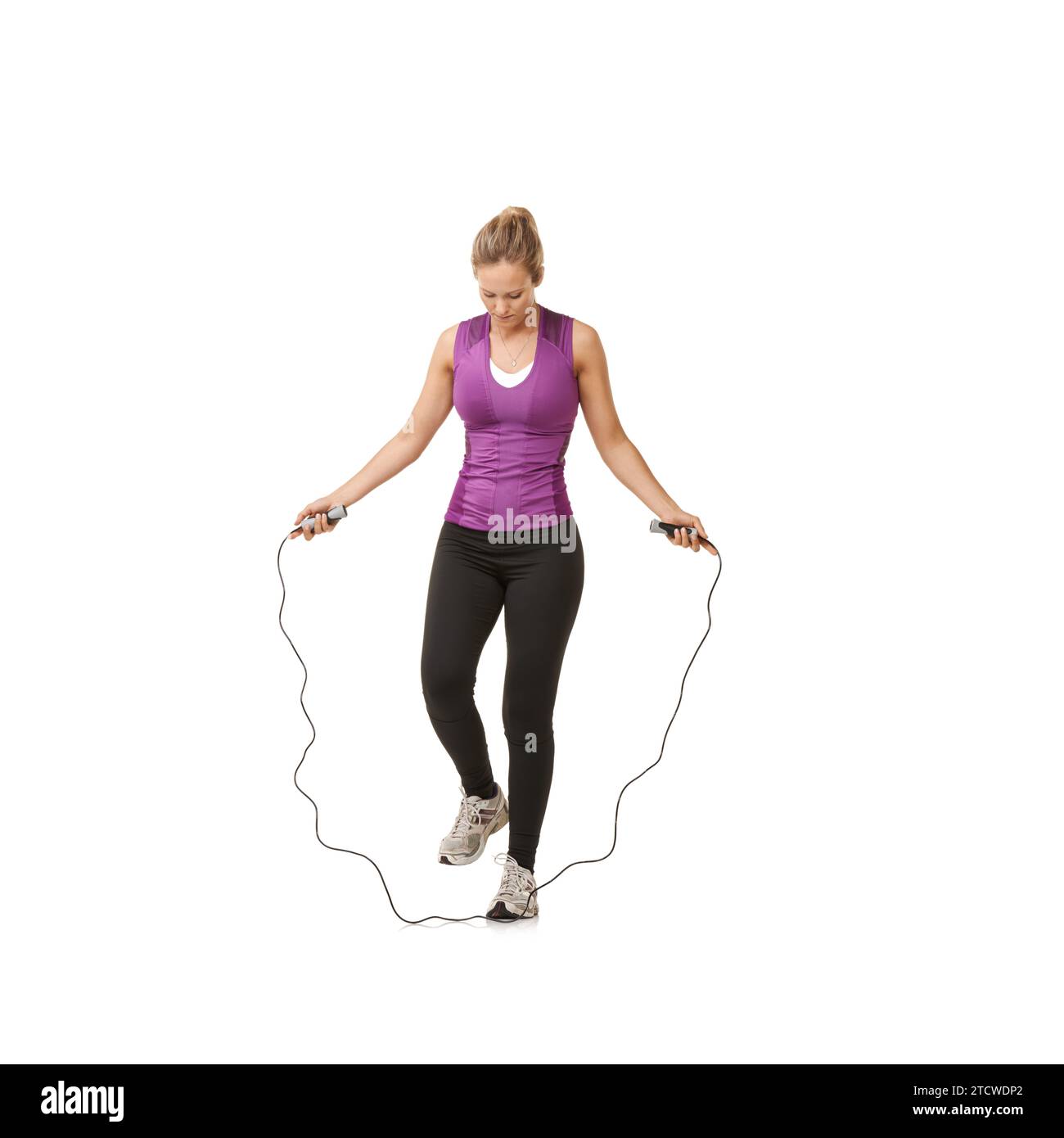 Fitness, skipping rope and woman on a white background for training ...