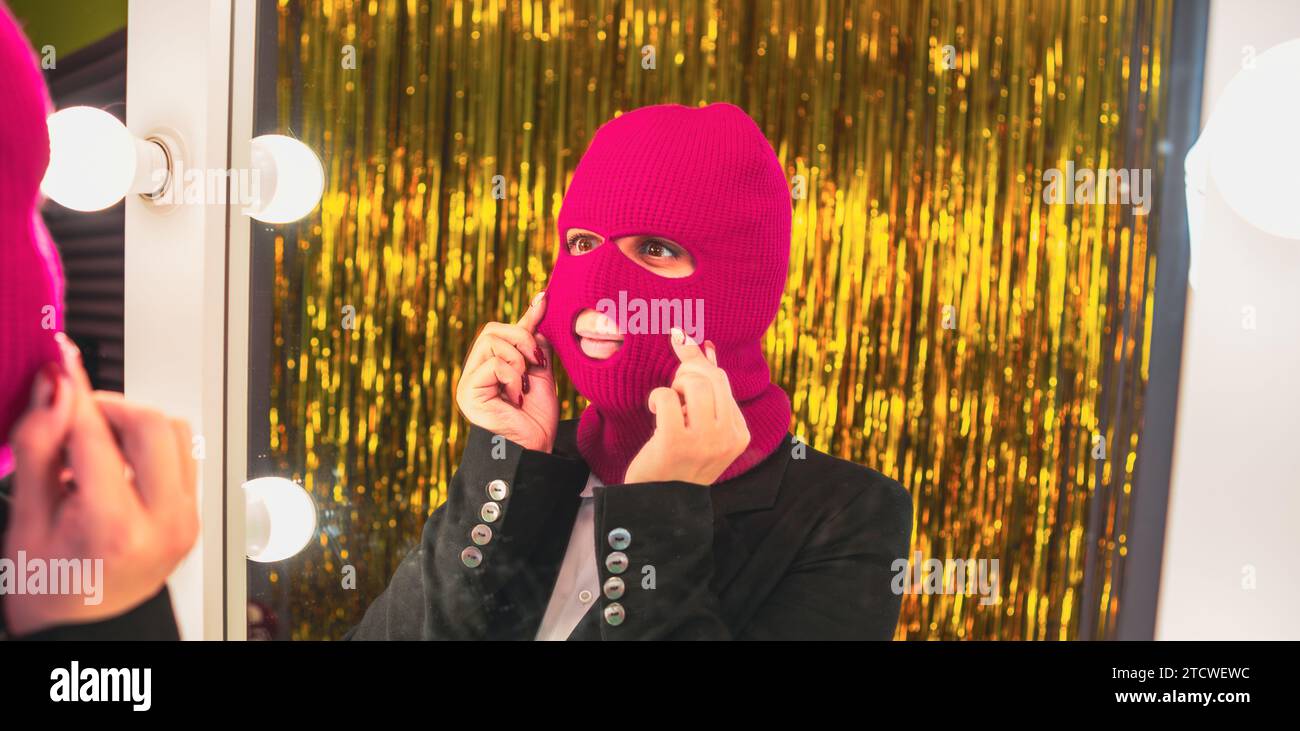 Pink balaclava hi-res stock photography and images - Alamy