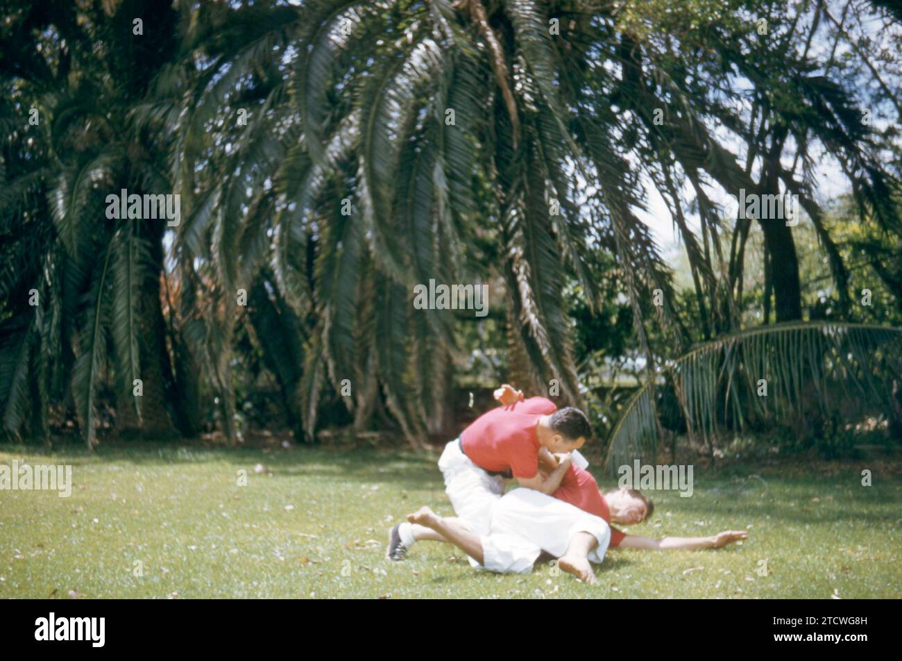 1950'S: Two men practice a karate flipping move circa 1950's. (Photo by ...