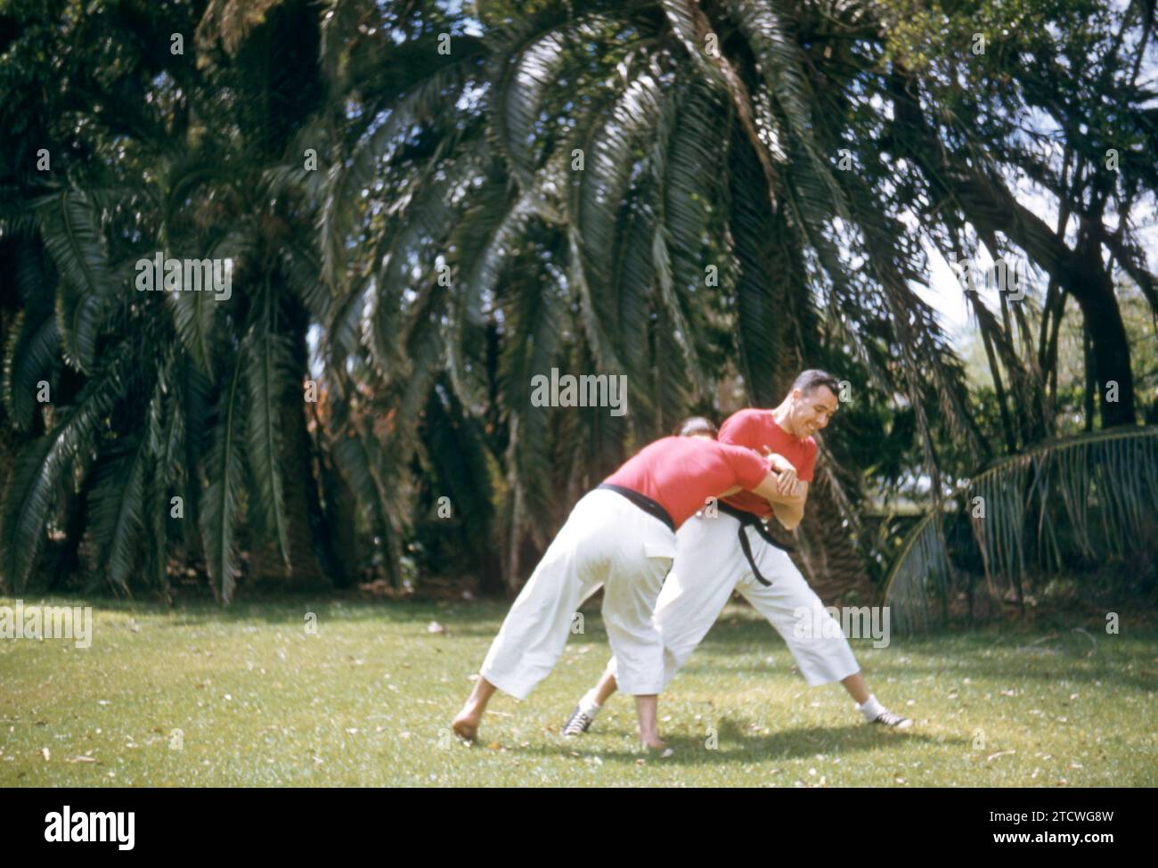 1950'S: Two men practice a karate flipping move circa 1950's. (Photo by ...