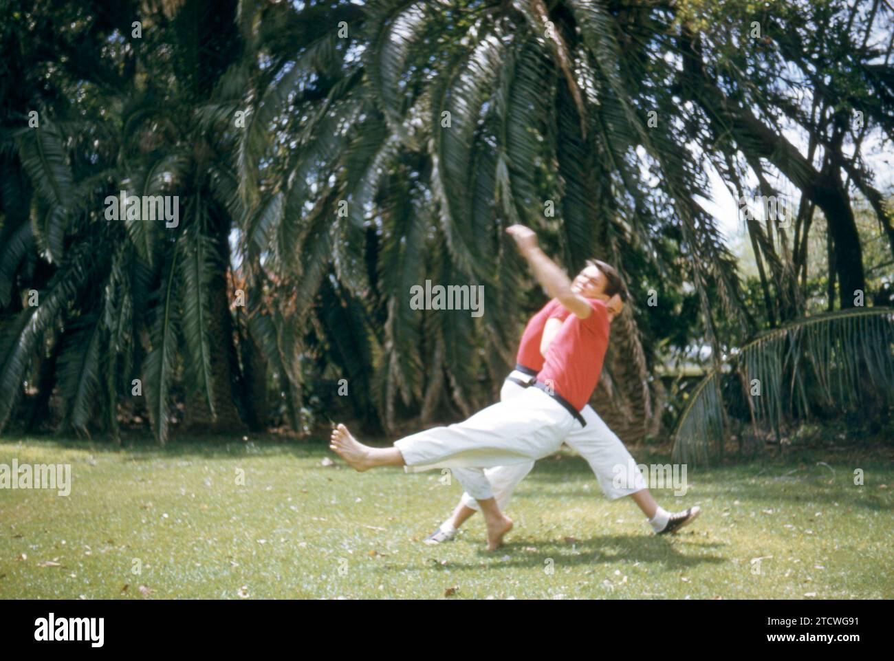1950'S: Two men practice a karate flipping move circa 1950's. (Photo by ...