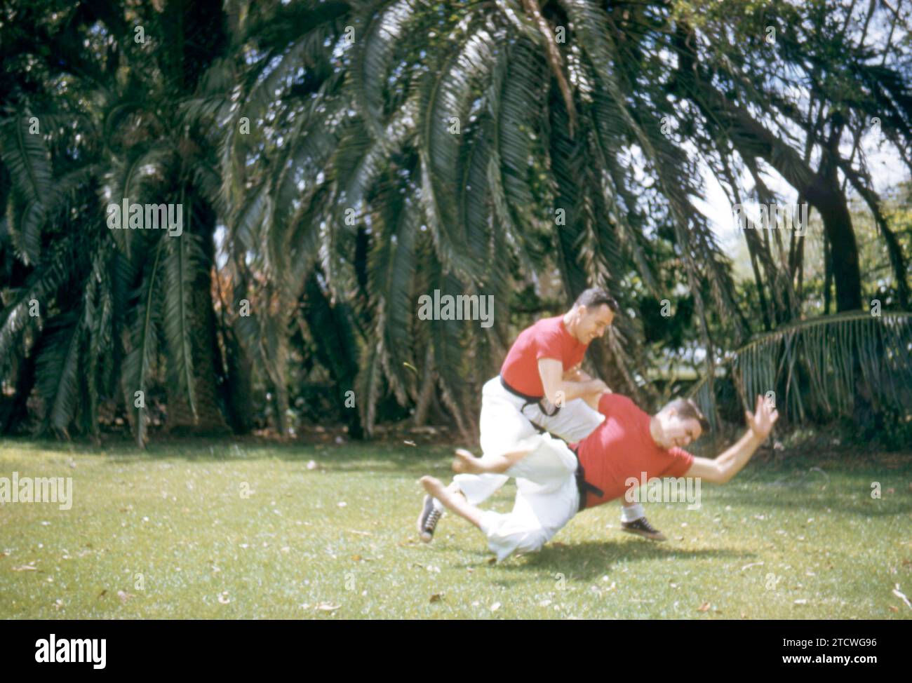 1950'S: Two men practice a karate flipping move circa 1950's. (Photo by ...
