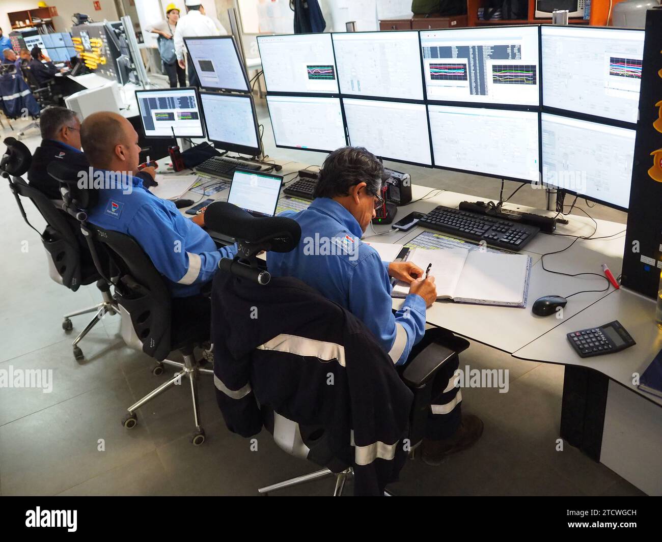 Petroperu personnel monitoring the systems in the control room of the ...