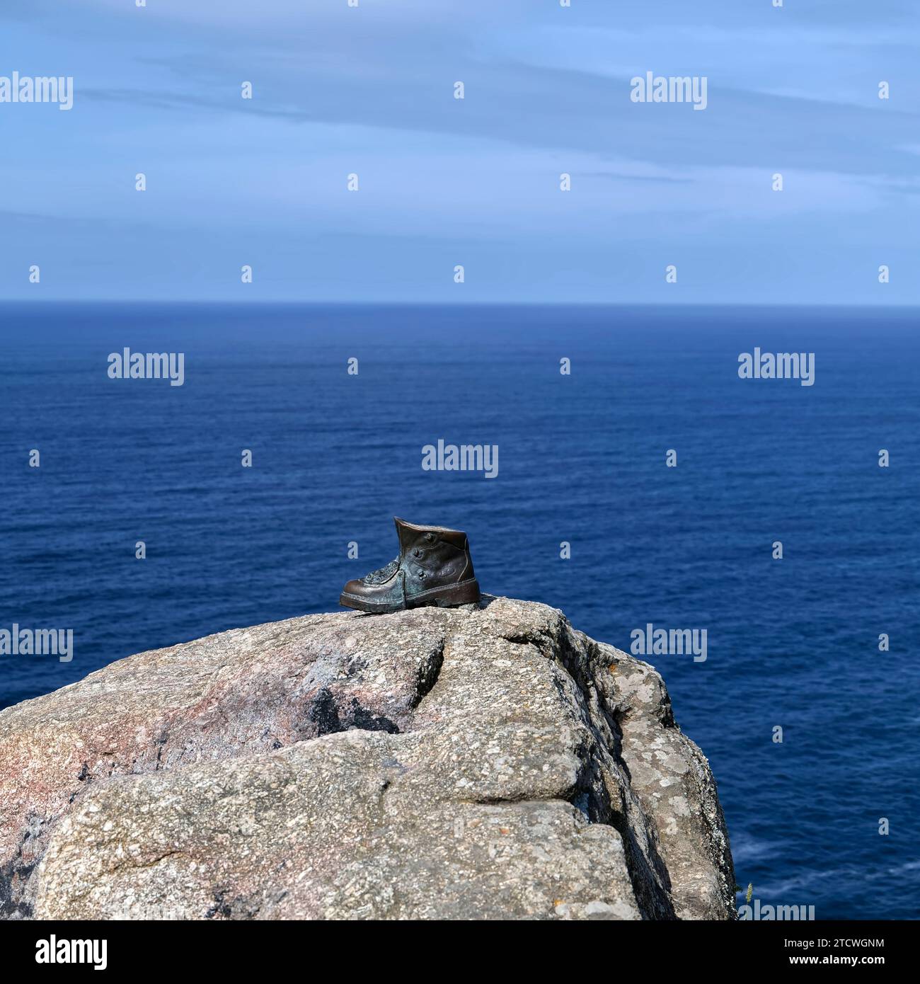 bronze pilgrim boot sculpture marks the end of the Camino, Cape ...