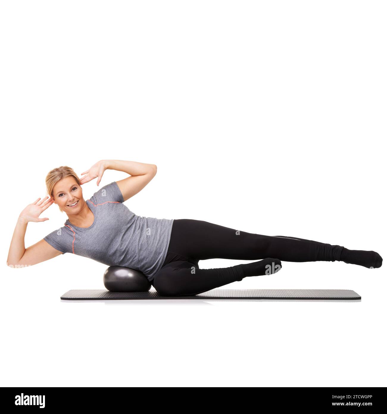 Woman, portrait and exercise ball balance on side for yoga mat ...