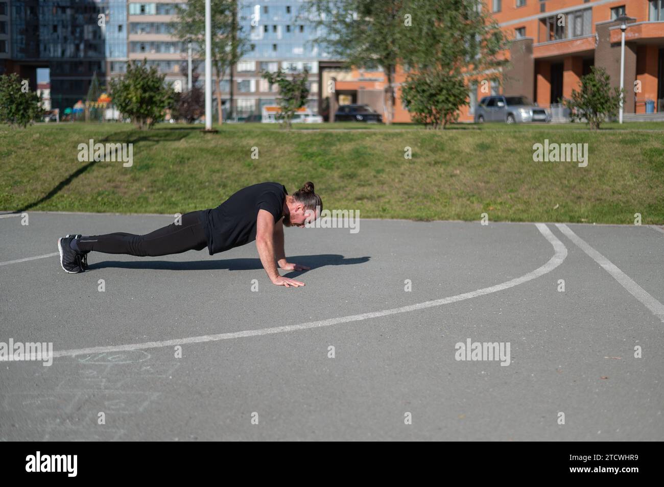Serious long hair muscular hi-res stock photography and images - Alamy
